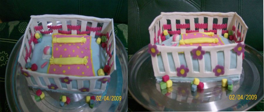 Baby On A Crib Cake - CakeCentral.com