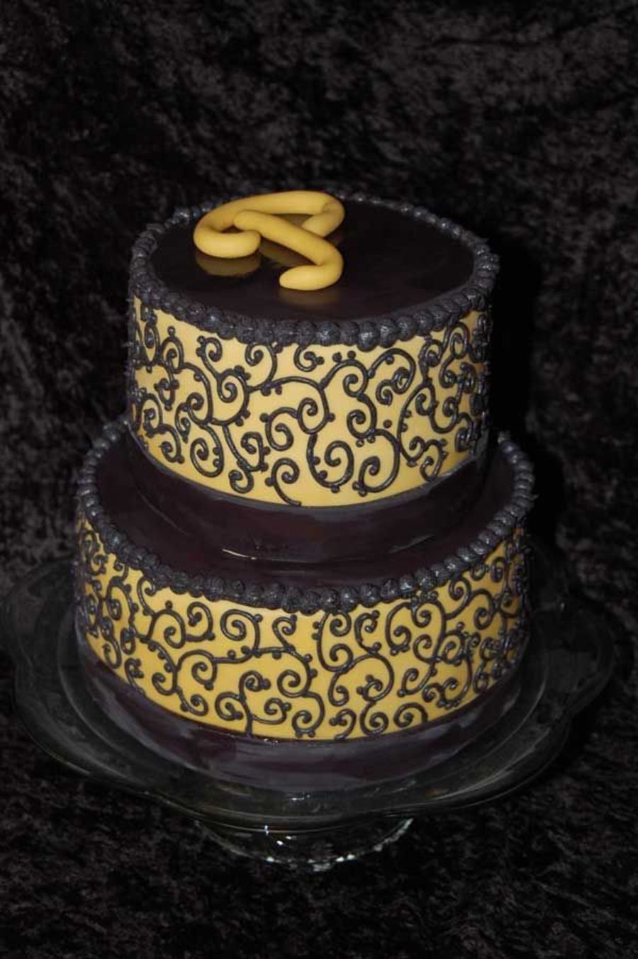 2 Tiered Yellow And Black Fondant With Scrollwork - CakeCentral.com
