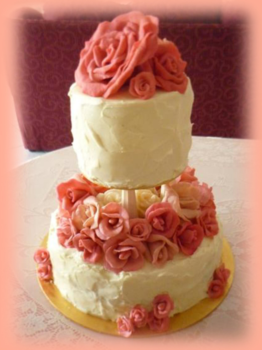 Chocolate Roses On 2-Tier White Ganache Cake - CakeCentral.com