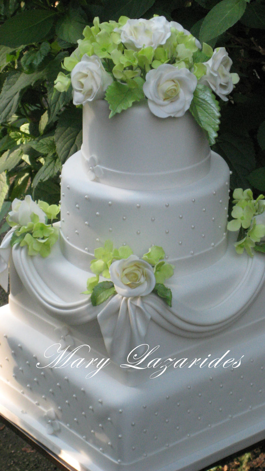 White Wedding Cake With Sugarpaste Roses And Hydrangeas - CakeCentral.com