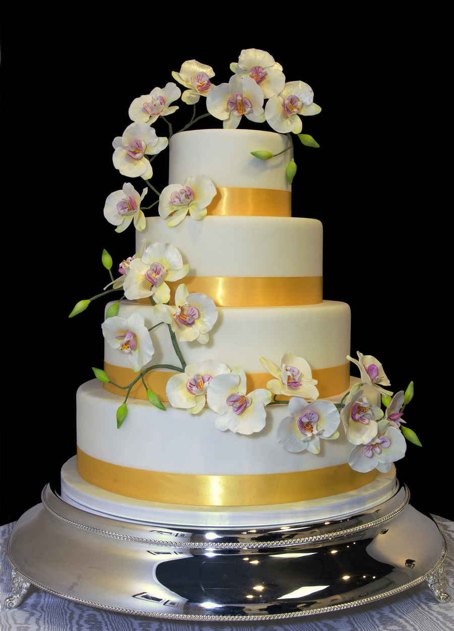 White Wedding Cake With Moth Orchid Cascade - CakeCentral.com