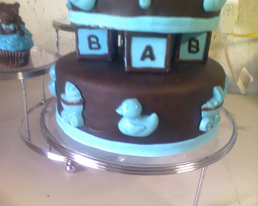 Baby Blocks Boy Shower Cake.. All Chocolate . Fondant . Rubber Ducky ..bow. Bear . Strollers ...