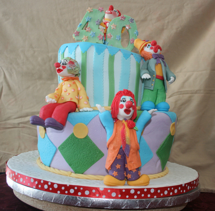 Clown Two Tier Topsy Turvey Birthday Cake - CakeCentral.com