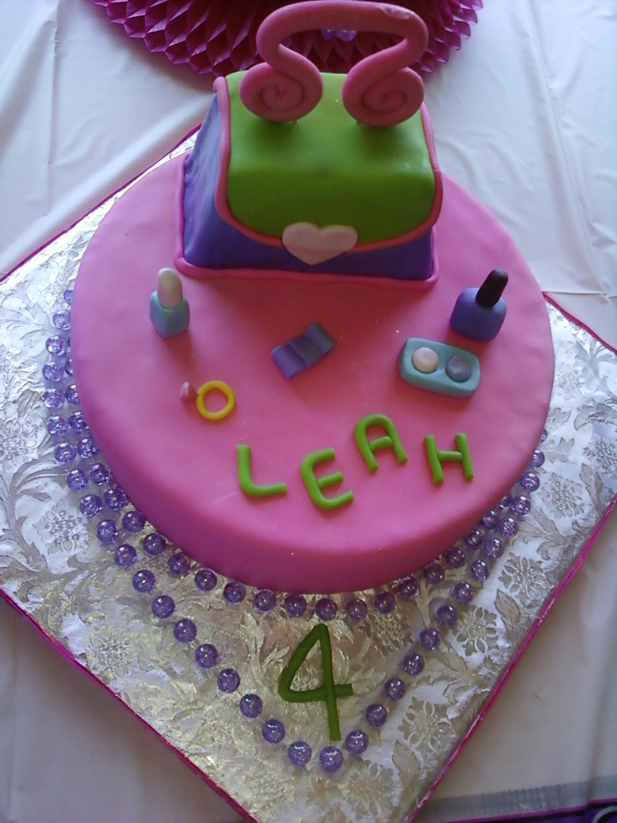 Purse Cake With Makeup - CakeCentral.com