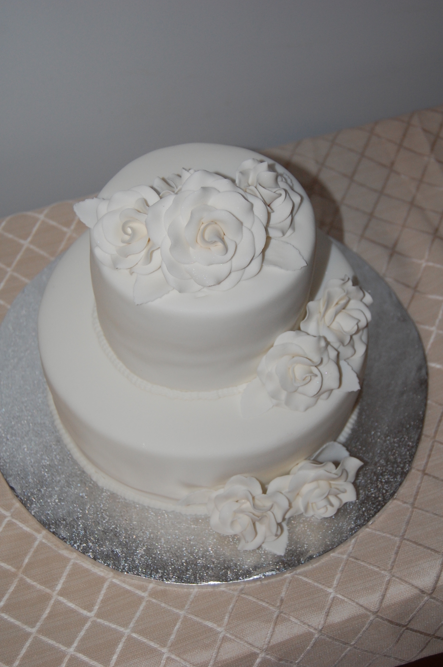 Two Tier White Wedding Cake With Open Roses - CakeCentral.com