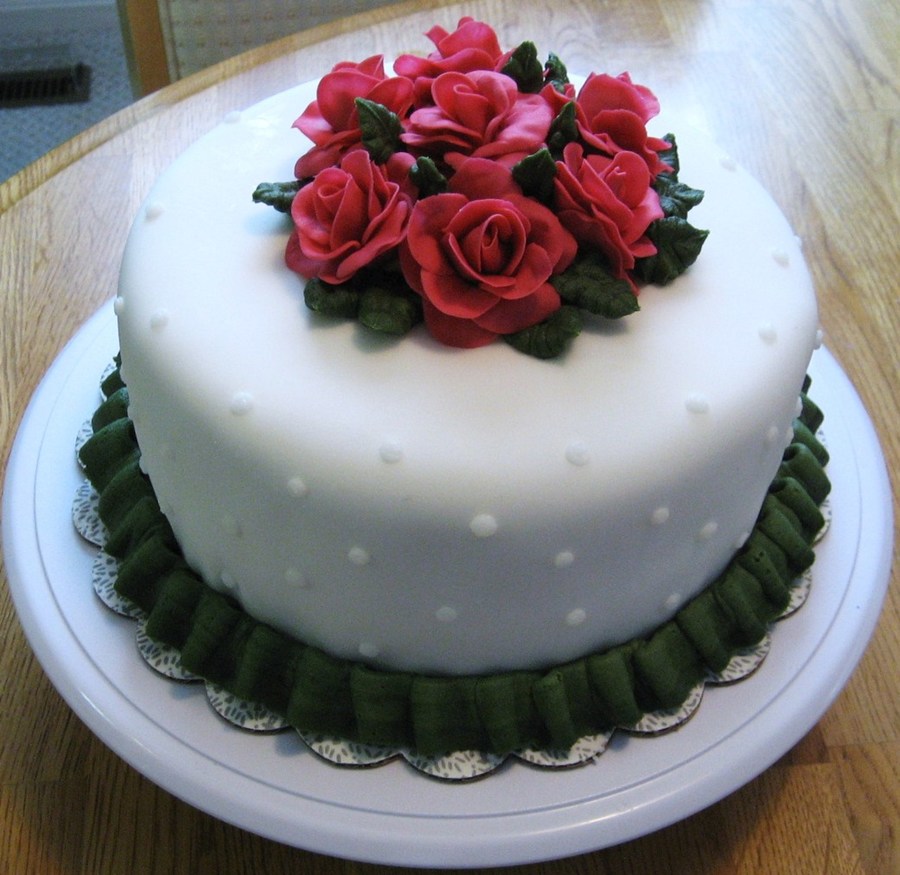 9" Layered Cake Covered In Fondant And Fondant Flowers - CakeCentral.com