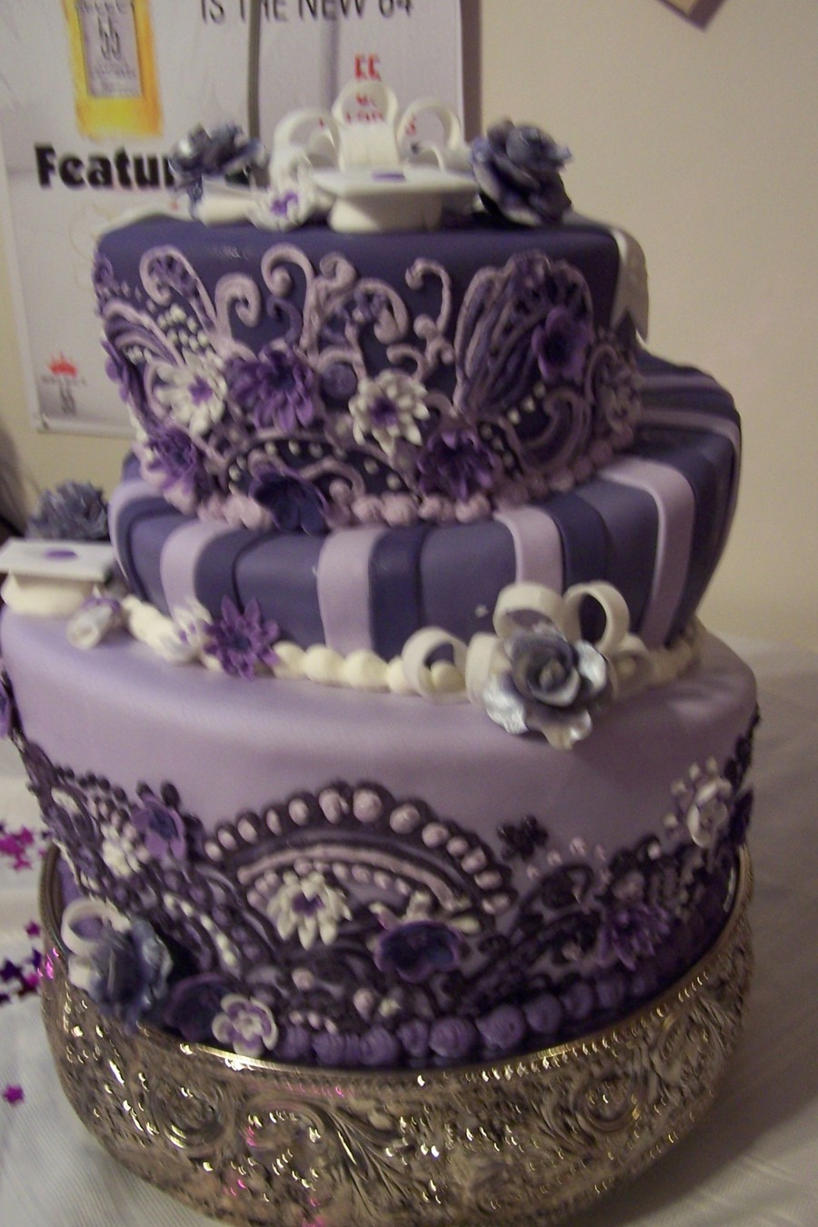 Purple Topsy Turvy Graduation Cake - CakeCentral.com