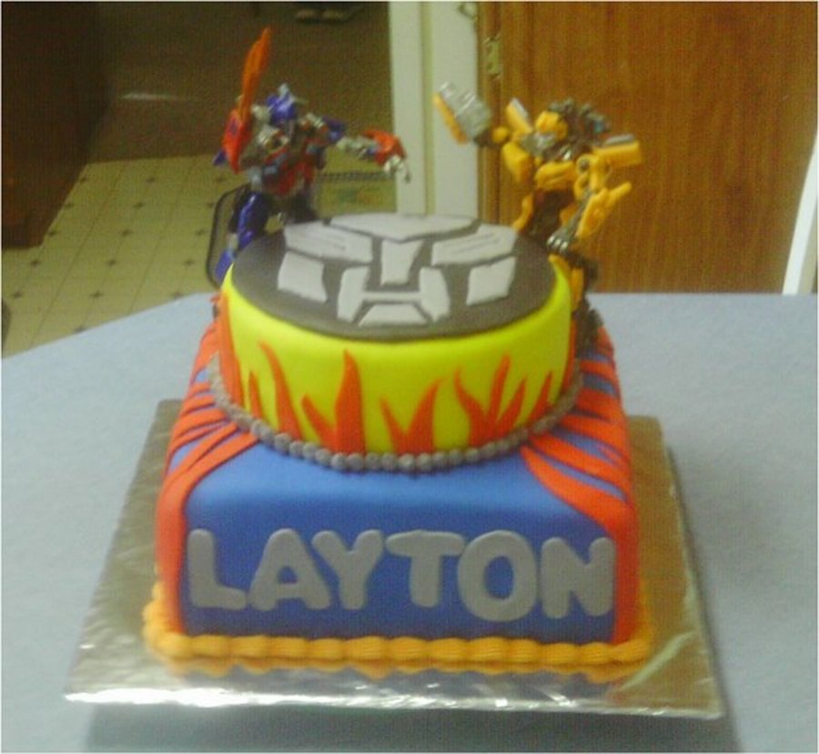 Optimus Prime And Bumble Bee Transformer Cake - CakeCentral.com