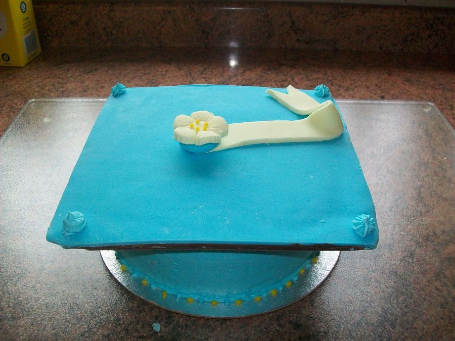 Blue And Yellow Single Flower Graduation Cake - CakeCentral.com