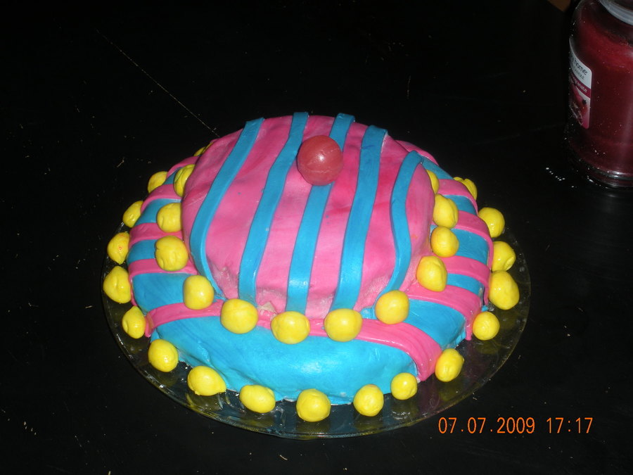 Pink, Blue And Yellow Cake - CakeCentral.com
