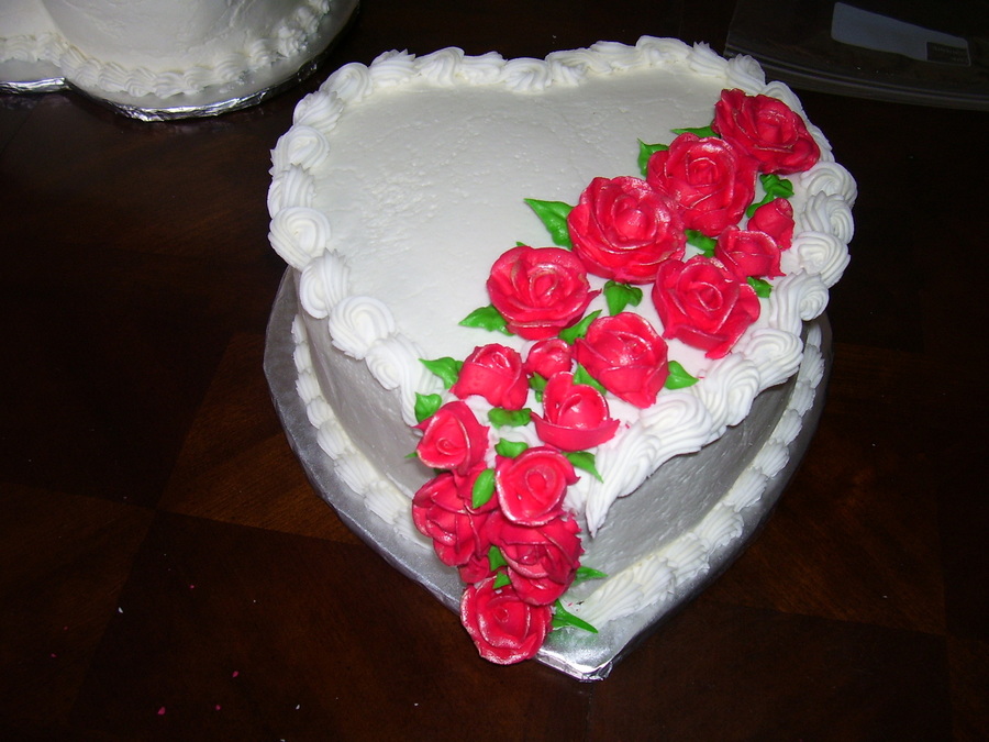 Heart Layers With Cascading Butter Cream Roses - CakeCentral.com