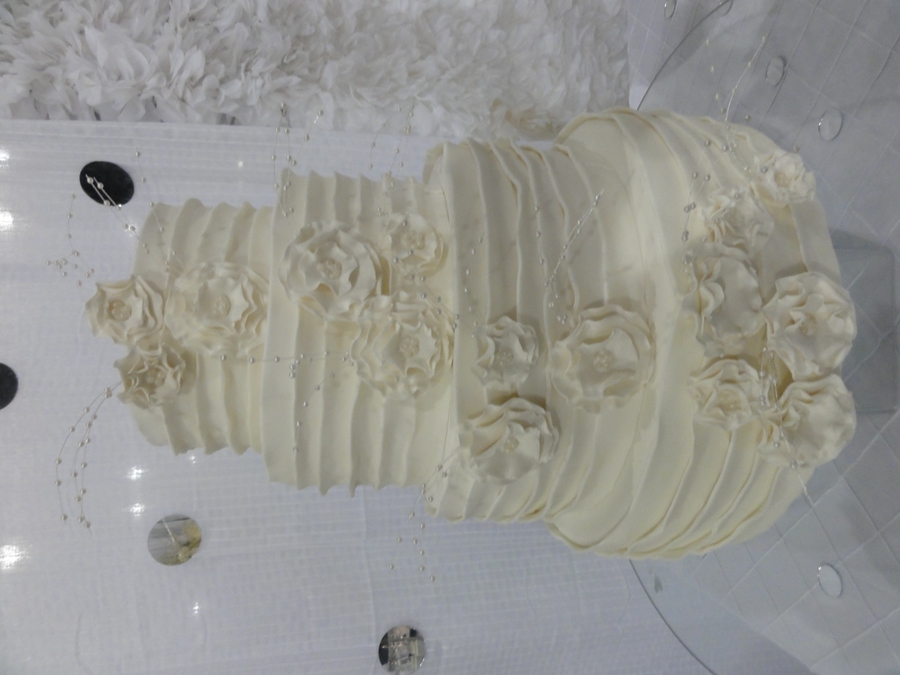Draped White Wedding Cake - CakeCentral.com