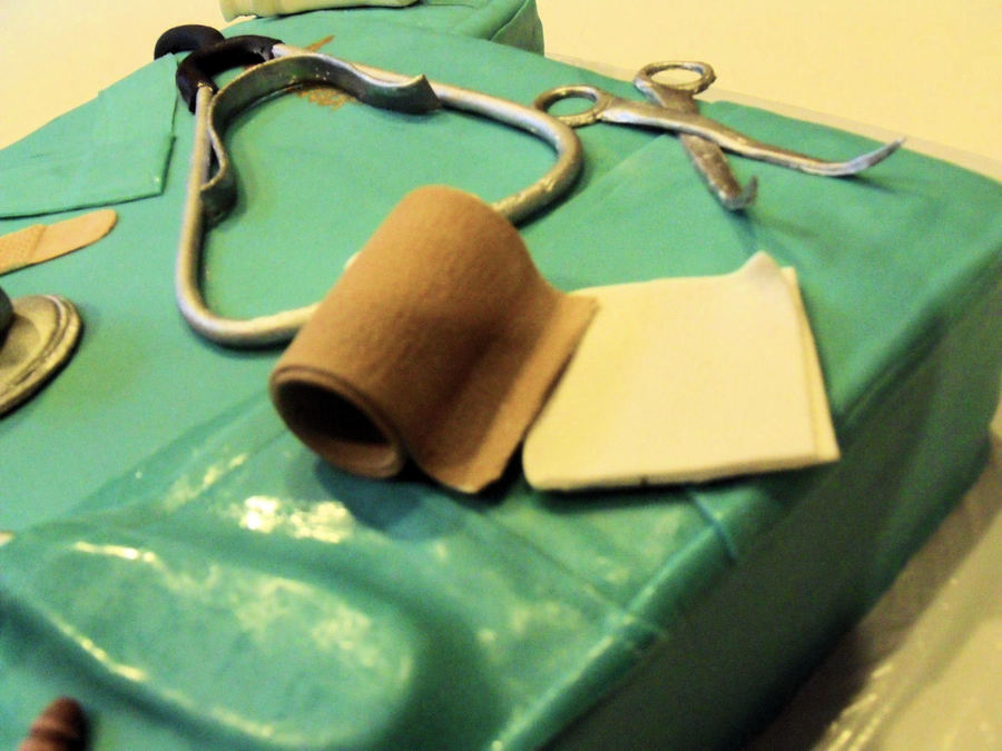 Nurse Scrubs Cake W/ Edible Instruments - CakeCentral.com