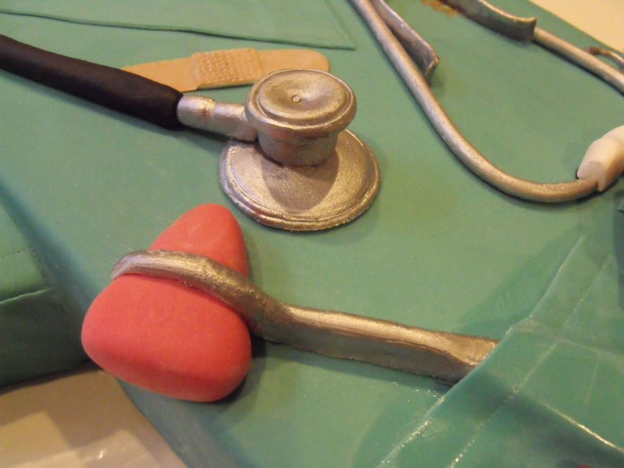 Nurse Scrubs Cake W/ Edible Instruments - CakeCentral.com