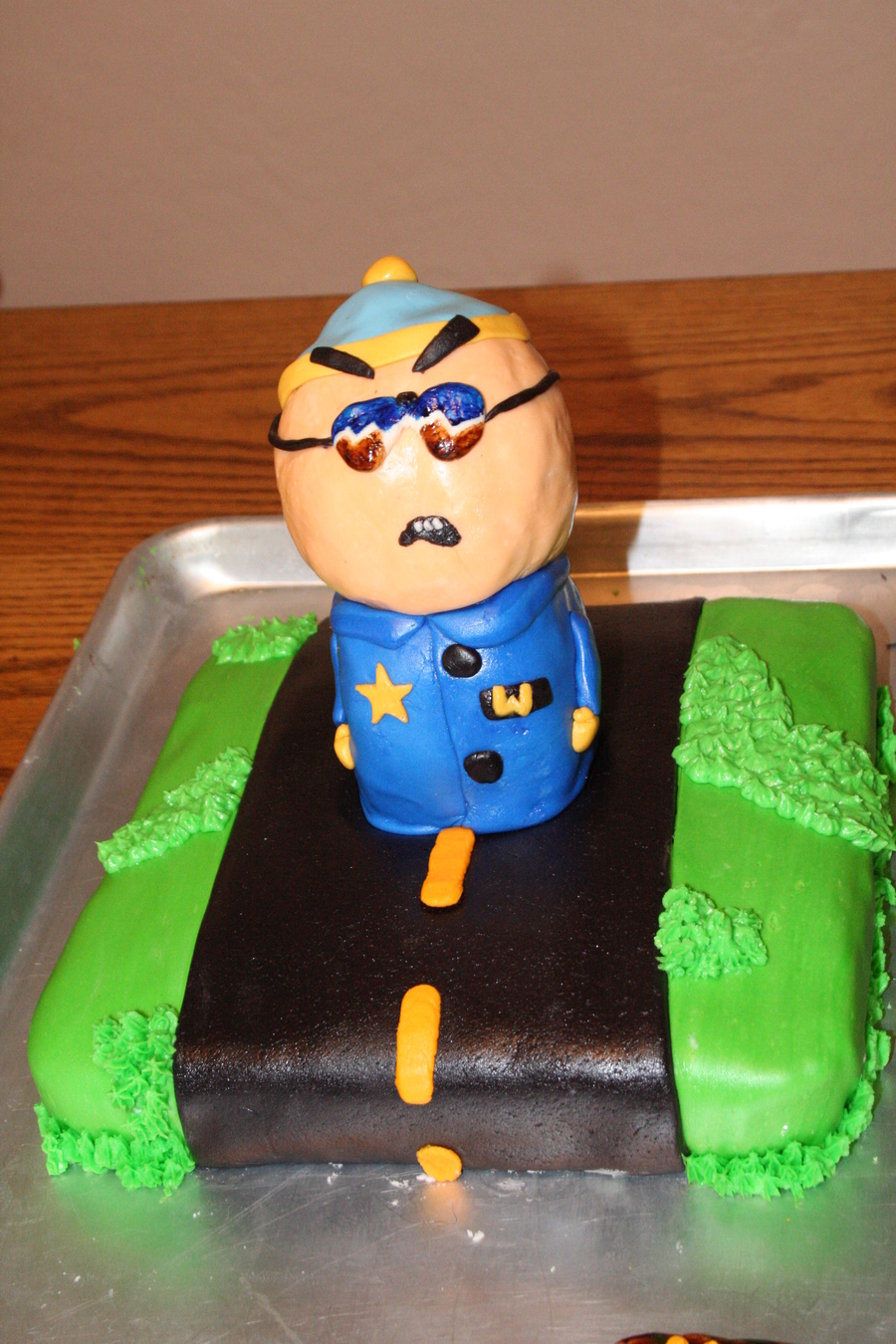 South Park Cop Cake - CakeCentral.com
