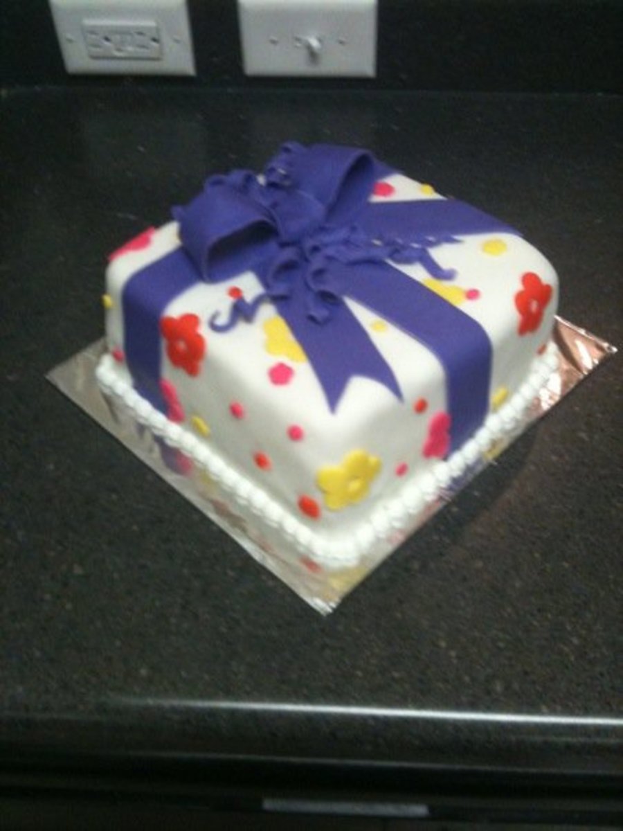 First Time Bow Cake - CakeCentral.com