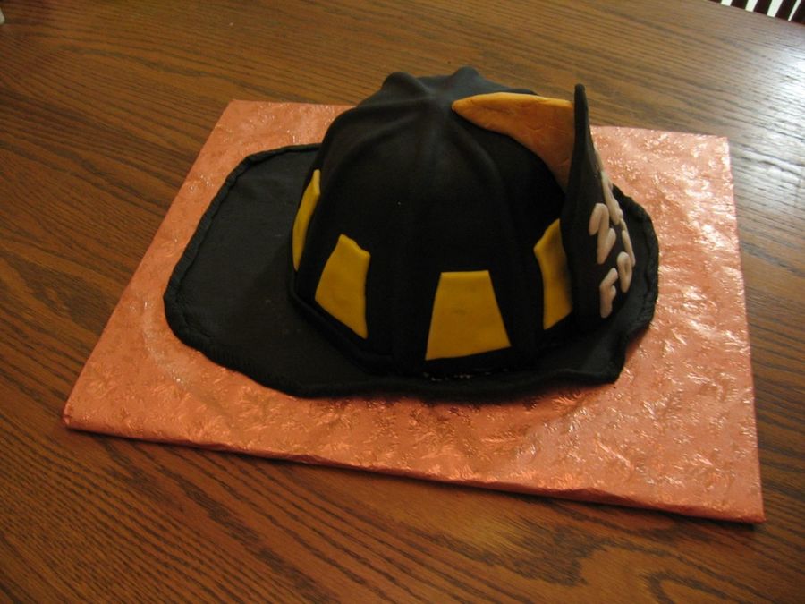 Fire Helmet Cake - CakeCentral.com