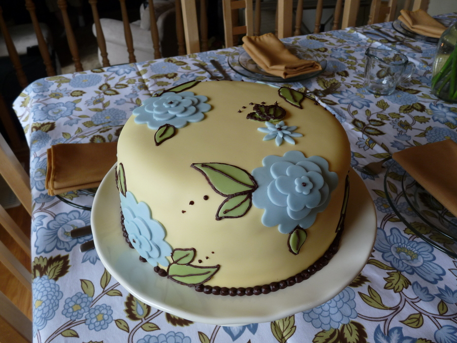 Butter Yellow And Periwinkle Flower Cake - CakeCentral.com