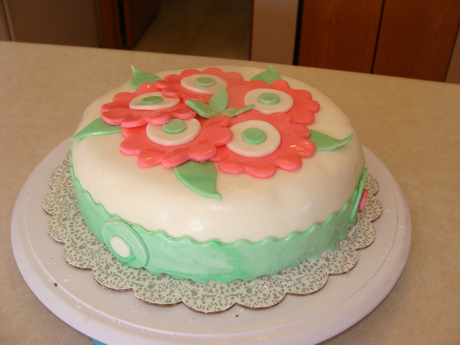 Marshmallow Fondant Cake With Flowers And Border - CakeCentral.com