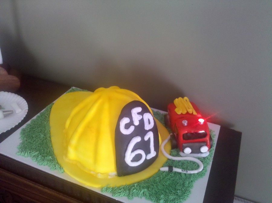Fire Helmet Cake - CakeCentral.com