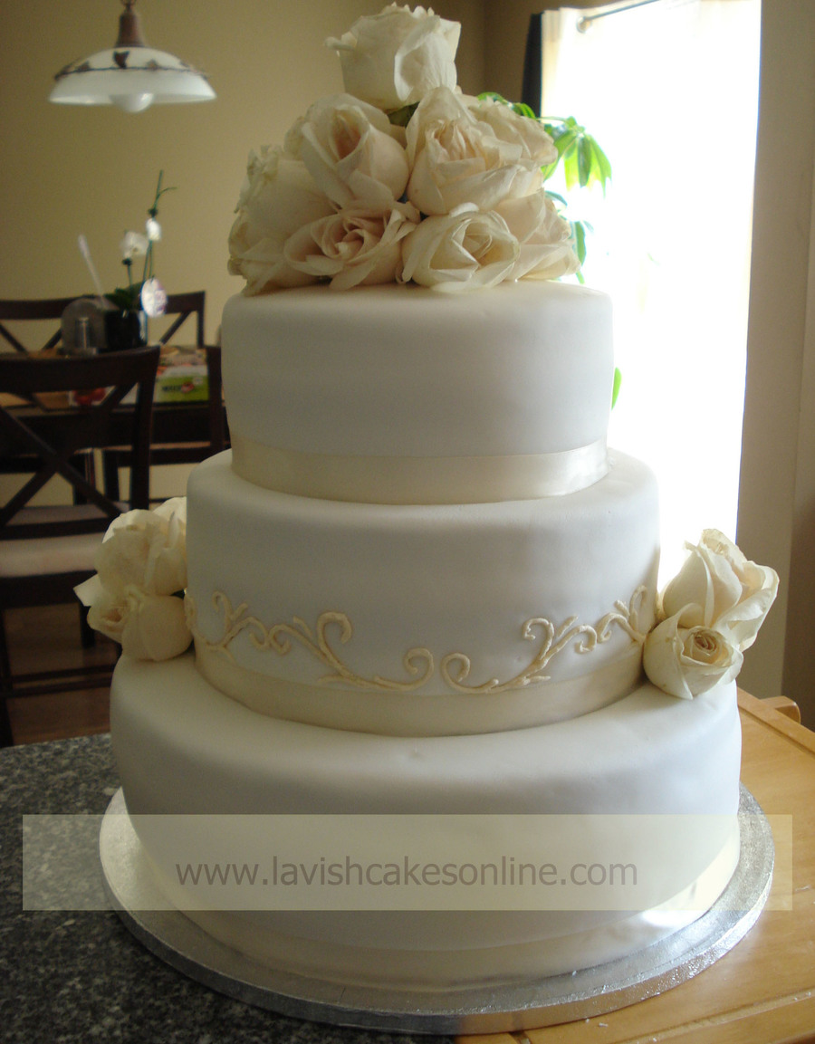 Ivory Themed Wedding Cake - CakeCentral.com