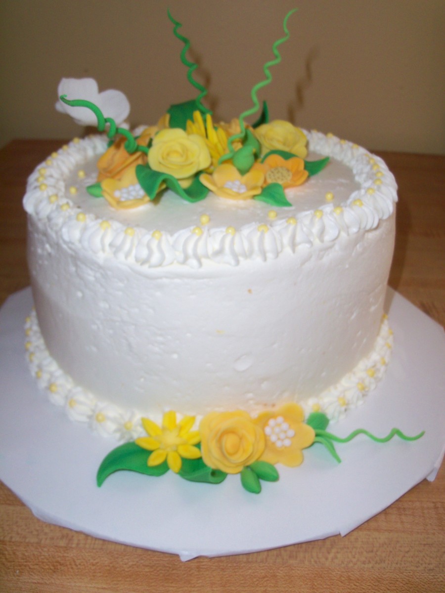 Birthday Cake With Yellow Flowers And A Butterfly - CakeCentral.com