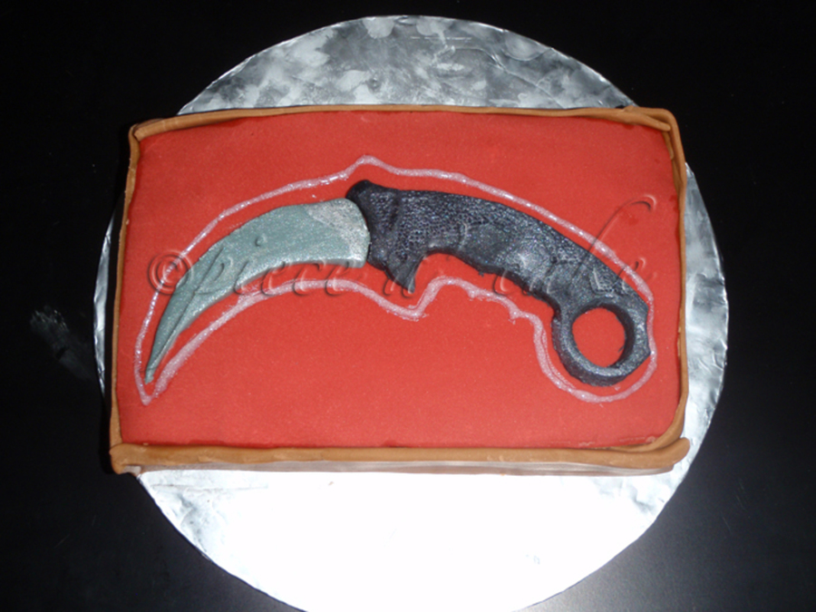 Kinfe Cake - CakeCentral.com