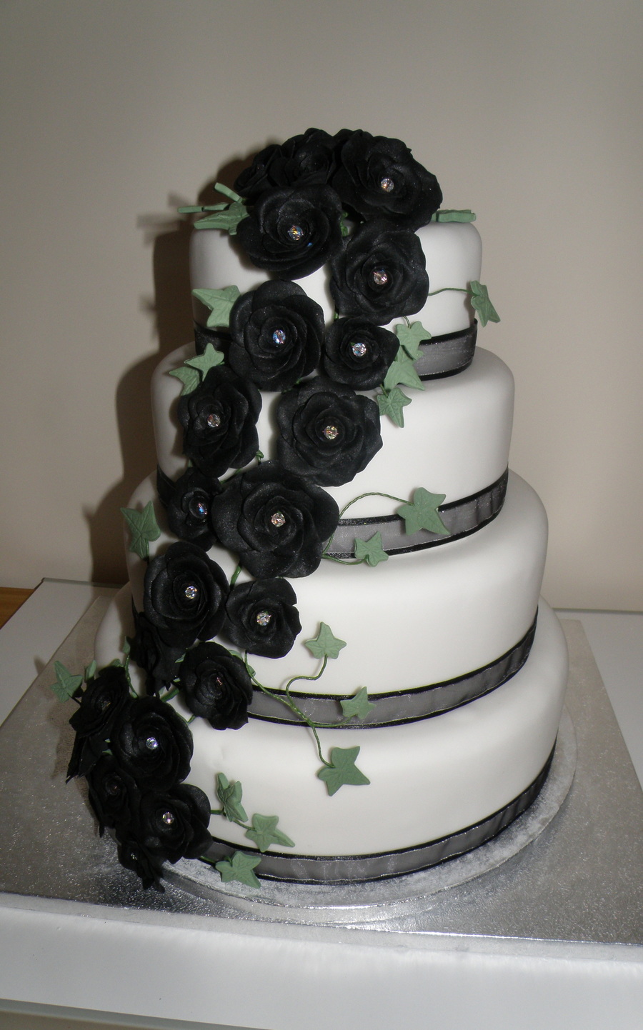 4 Tier Black And White Rose Wedding Cake - CakeCentral.com