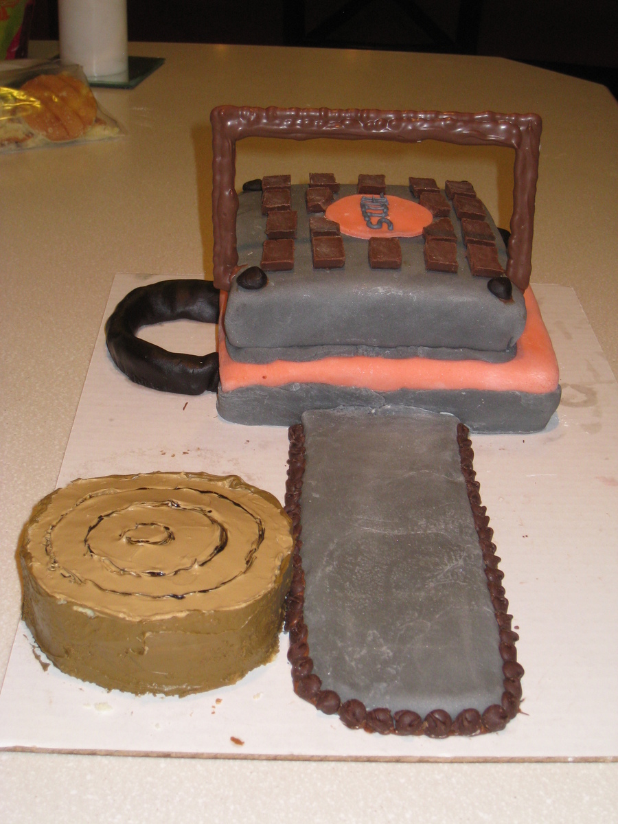 Chainsaw Cake - CakeCentral.com