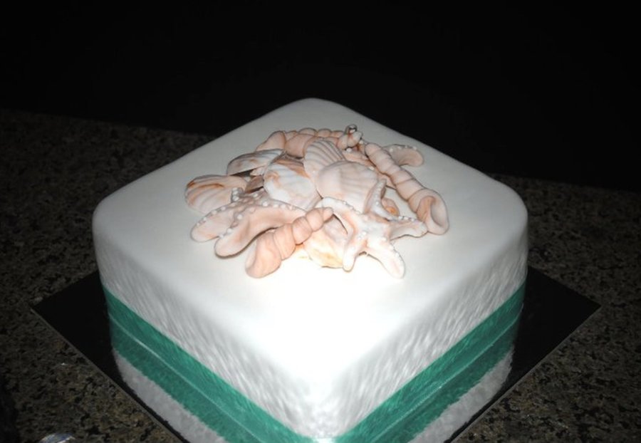 White Fondant Beach Shell Wedding Cake - CakeCentral.com