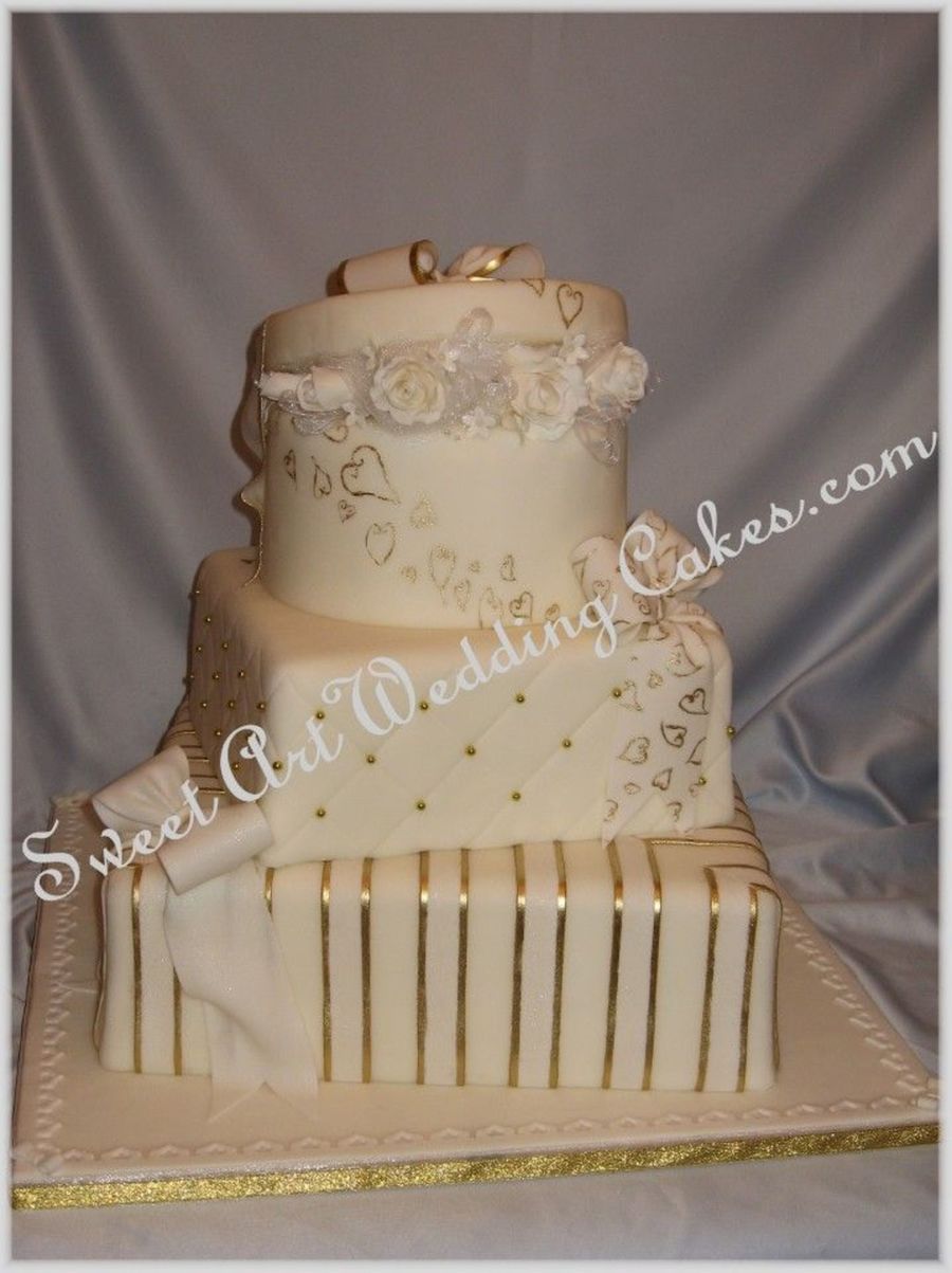 White And Gold Packages - CakeCentral.com