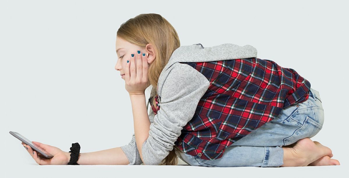 Photo | Teen on cell phone | UCLA