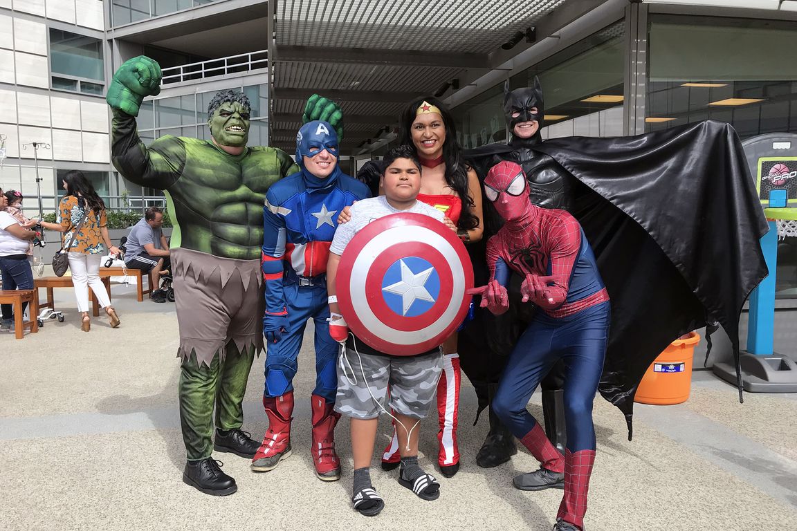 Superhero window washers descend from hospital roof to lift kids ...