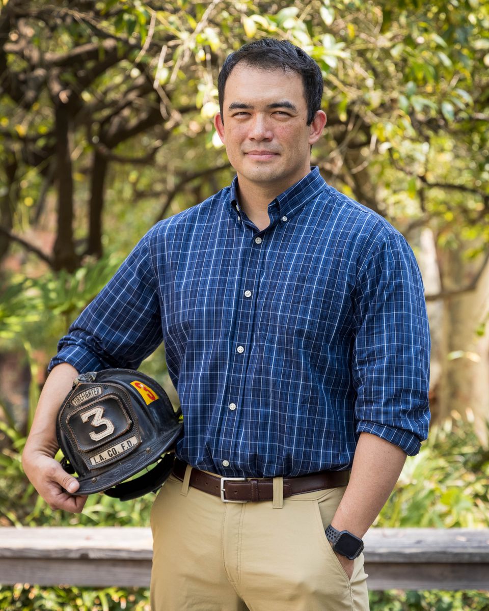 Photo | Derek Urwin 2021 garden photo with helmet | UCLA