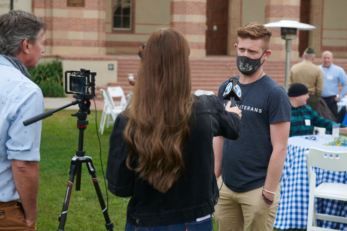 Photo | Daryl Barker being interviewed outside | UCLA