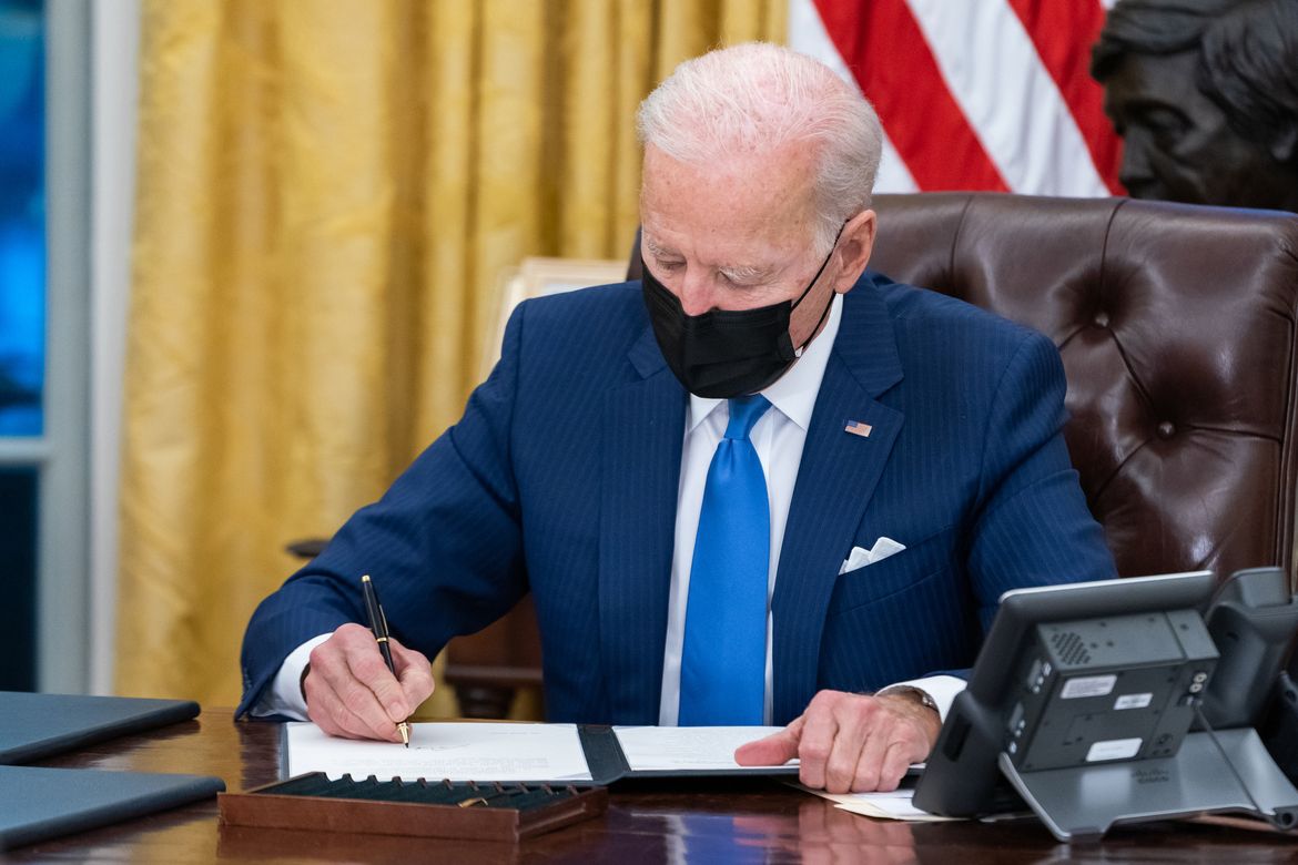 Photo | President Biden at his desk | UCLA