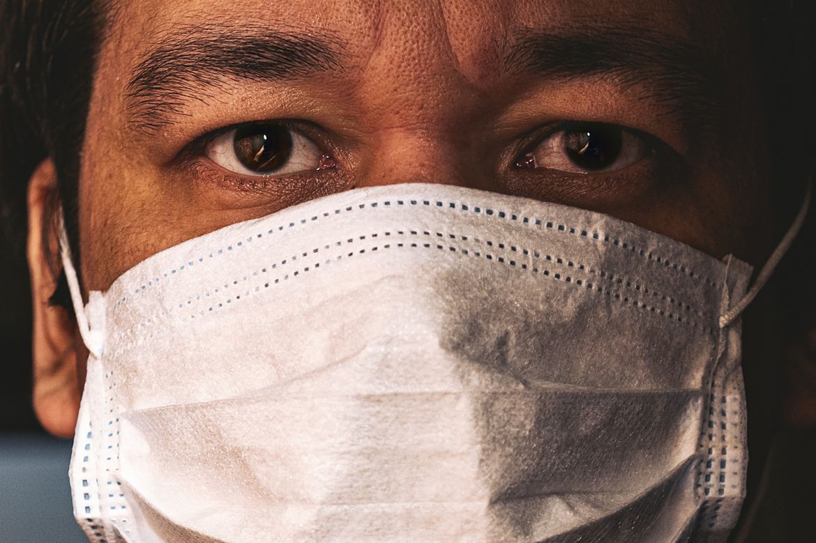 Photo | Man in mask | UCLA