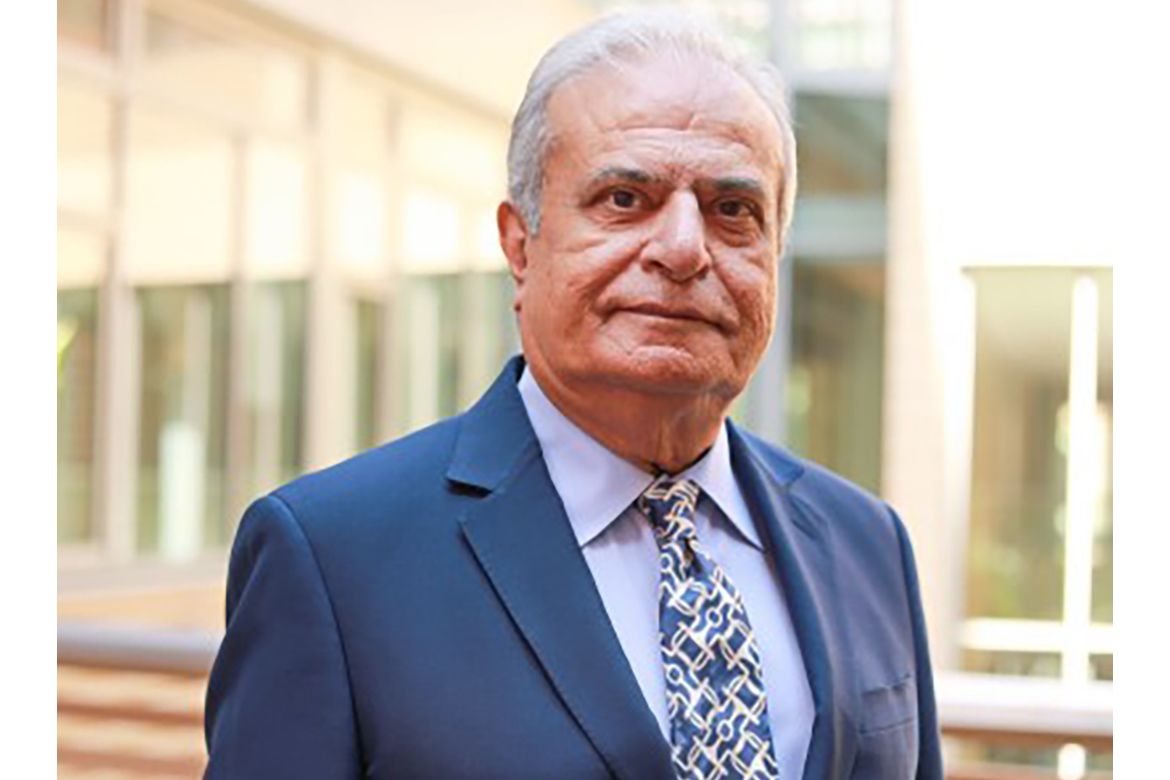 Photo | Head-and-shoulders photo of Asad Madni in suit and tie | UCLA