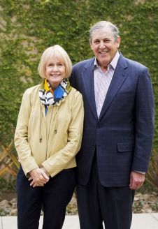 Photo | Dr. Jonathan and Karin Fielding in front of ivy-covered wall | UCLA