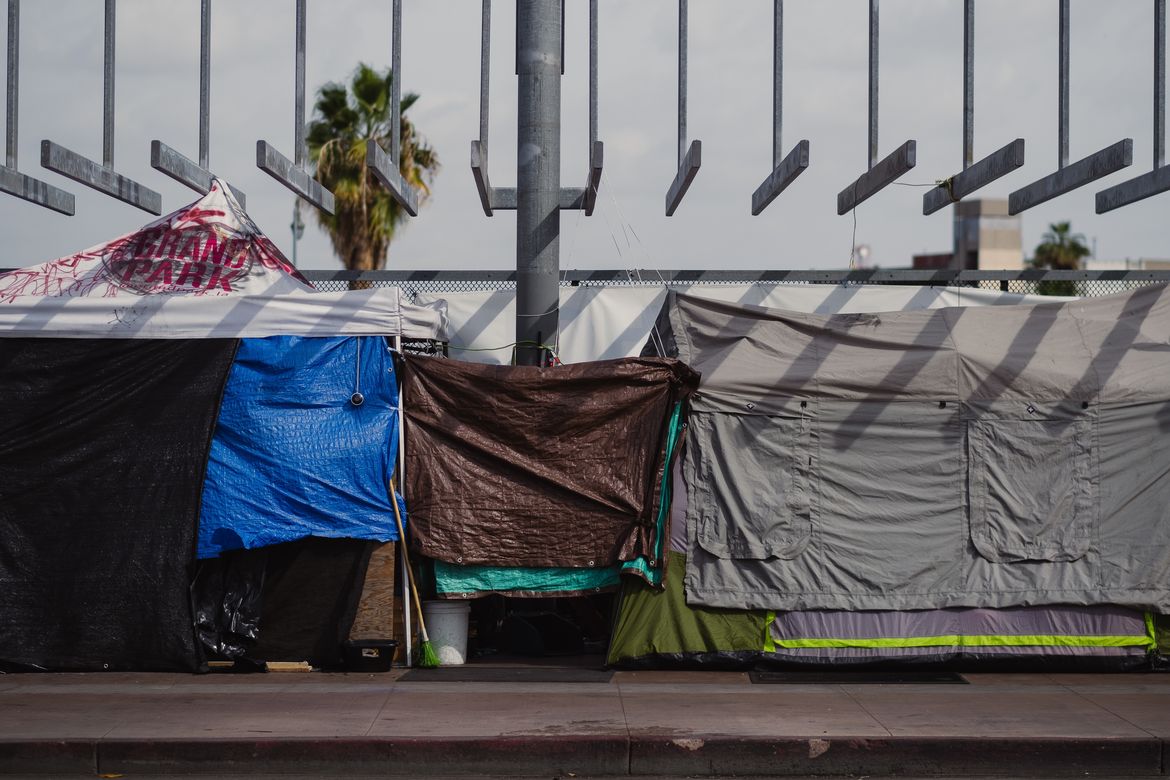 Photo | Tents on city sidewalk | UCLA