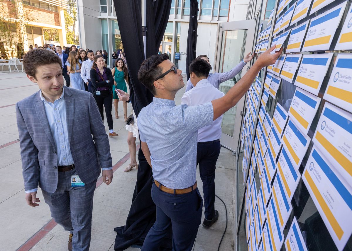 Photo | David Shabsovich and David Okikawa with Match Day envelopes | UCLA