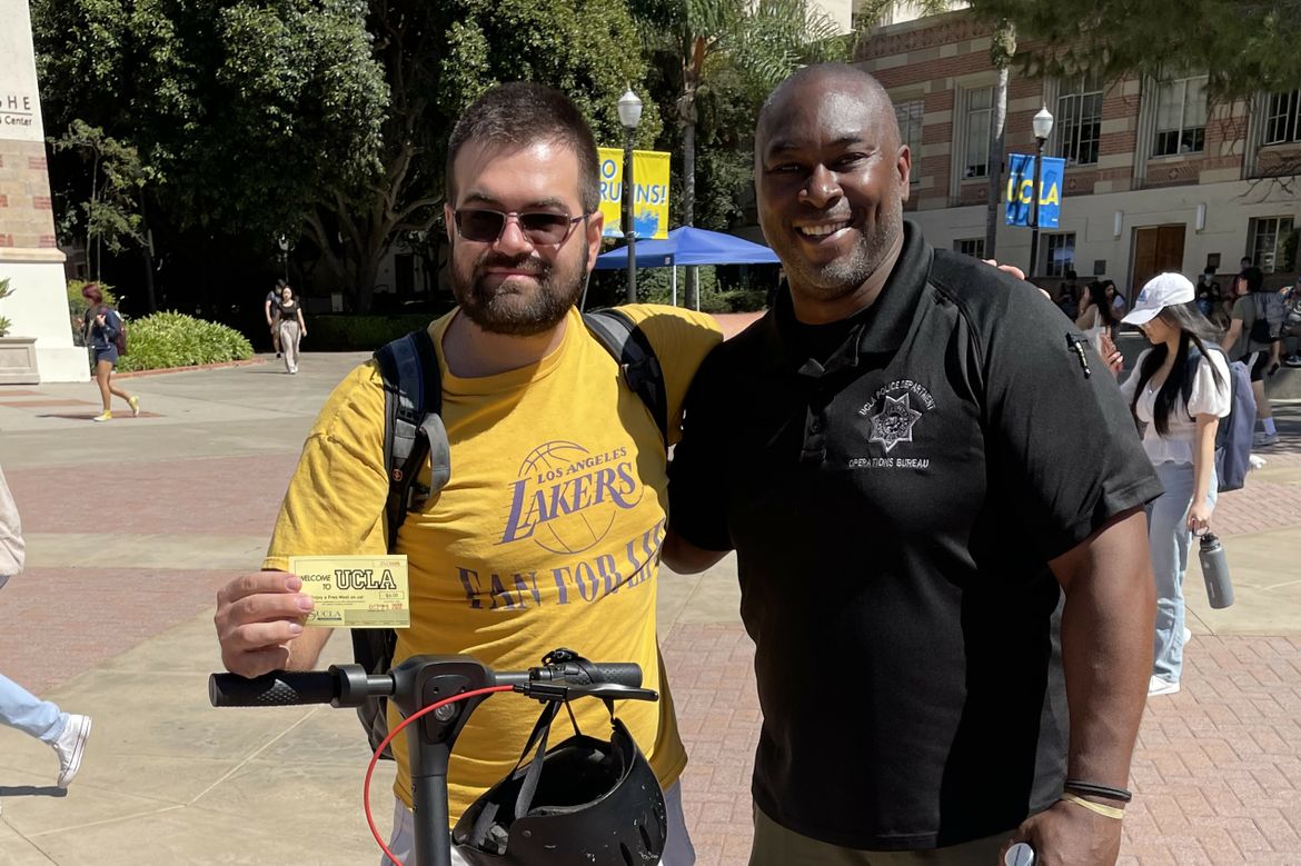 Photo | London McBride with UCLA student | UCLA