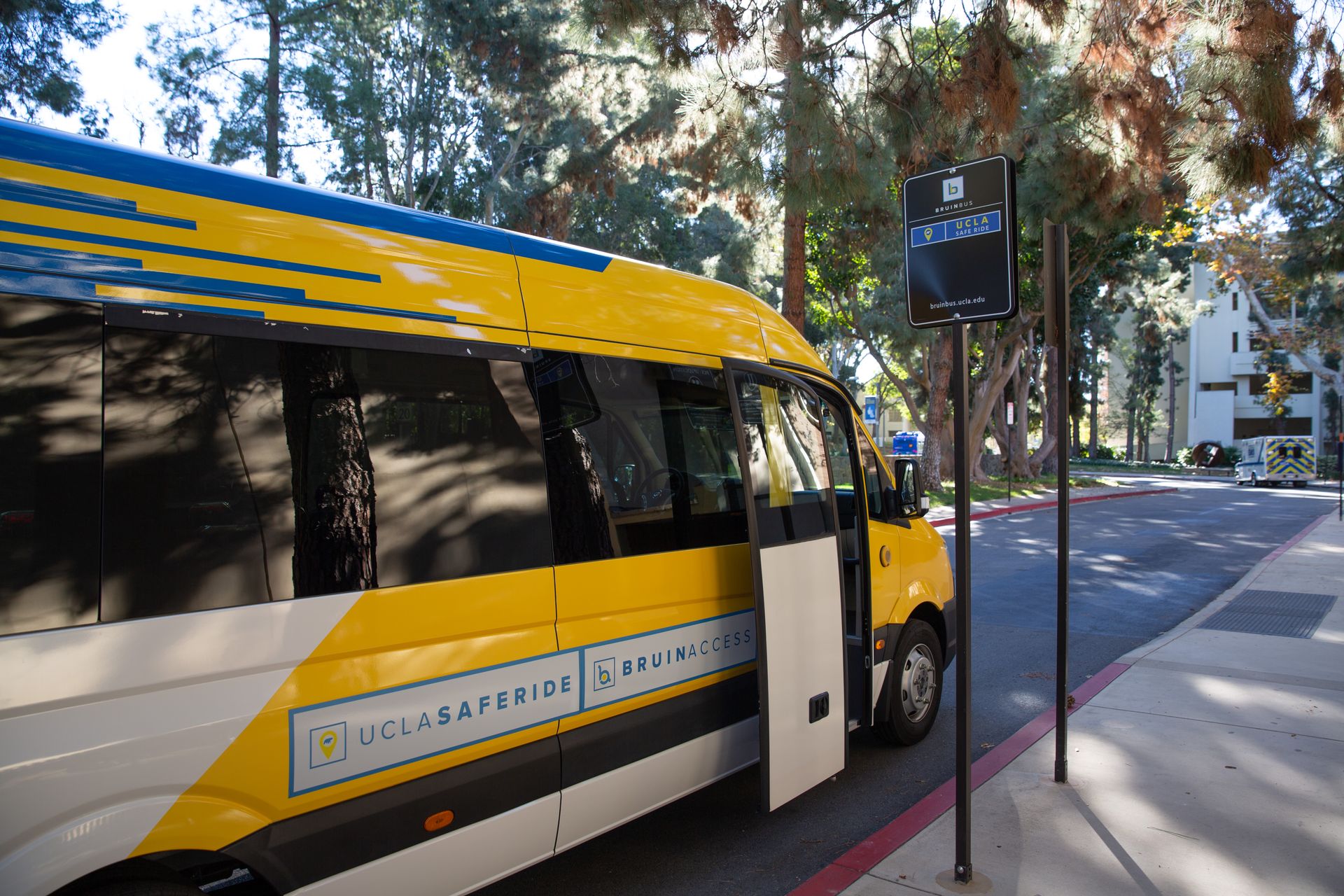 Photo | SafeRide van at a UCLA campus bus stop | UCLA