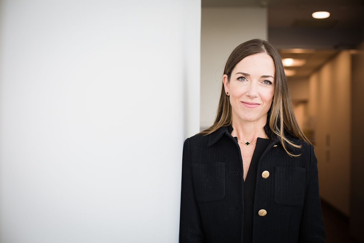 Photo | Sara Hurvitz standing in the hallway of a building | UCLA