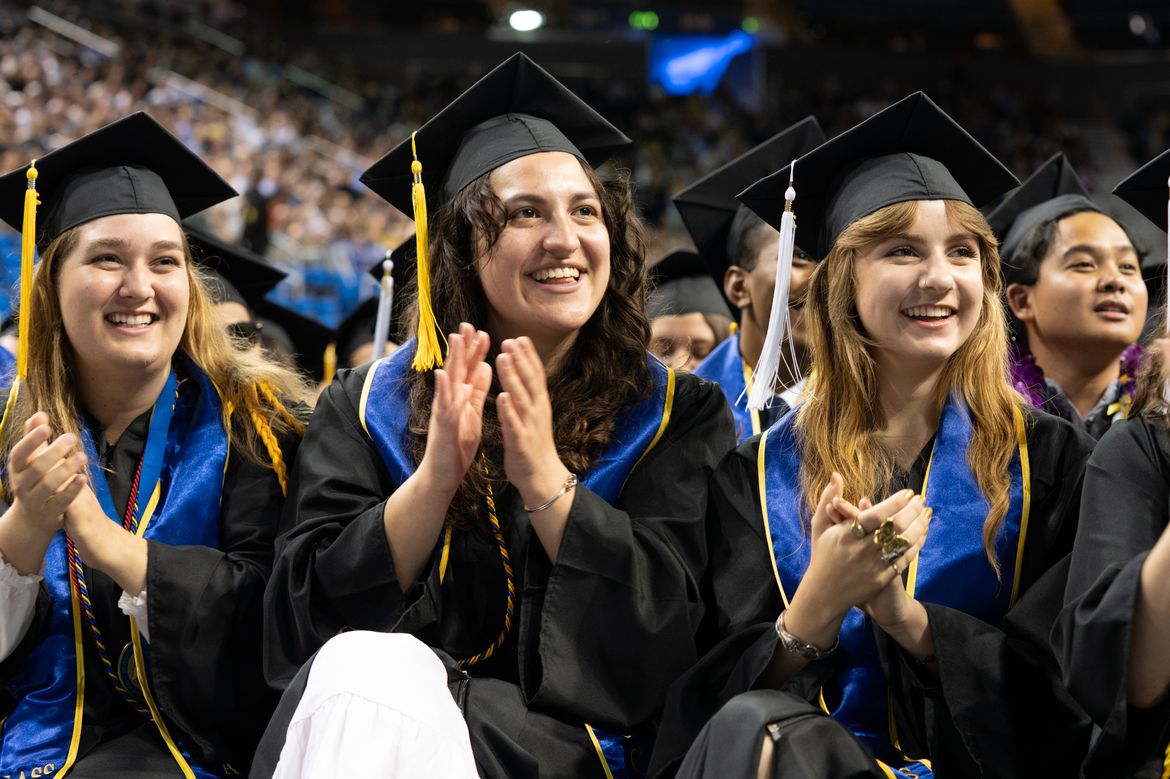 Photo | Graduates applauding at UCLA College commencement | UCLA