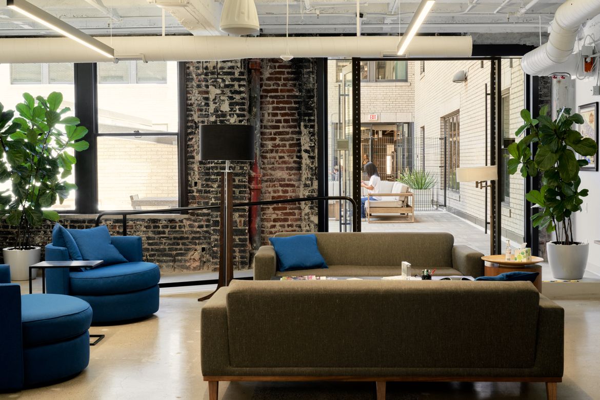 Photo | A room inside the Trust Building that looks out on a patio | UCLA