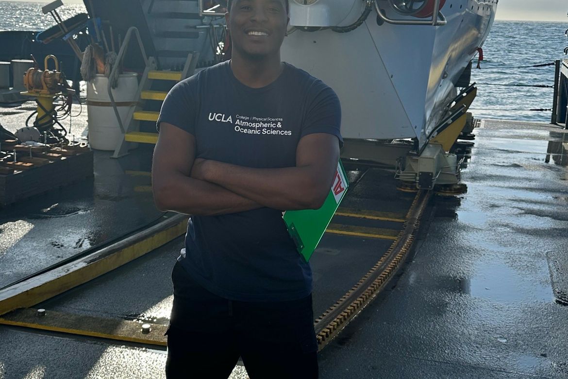 Photo | De'Marcus Robinson on a boat in Santa Barbara Basin | UCLA