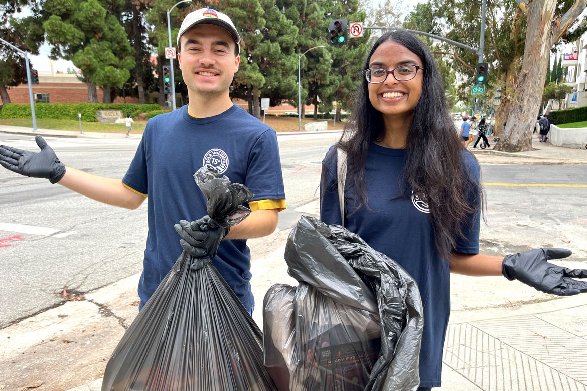 Photo | UCLA students participating in a street beautification project ...