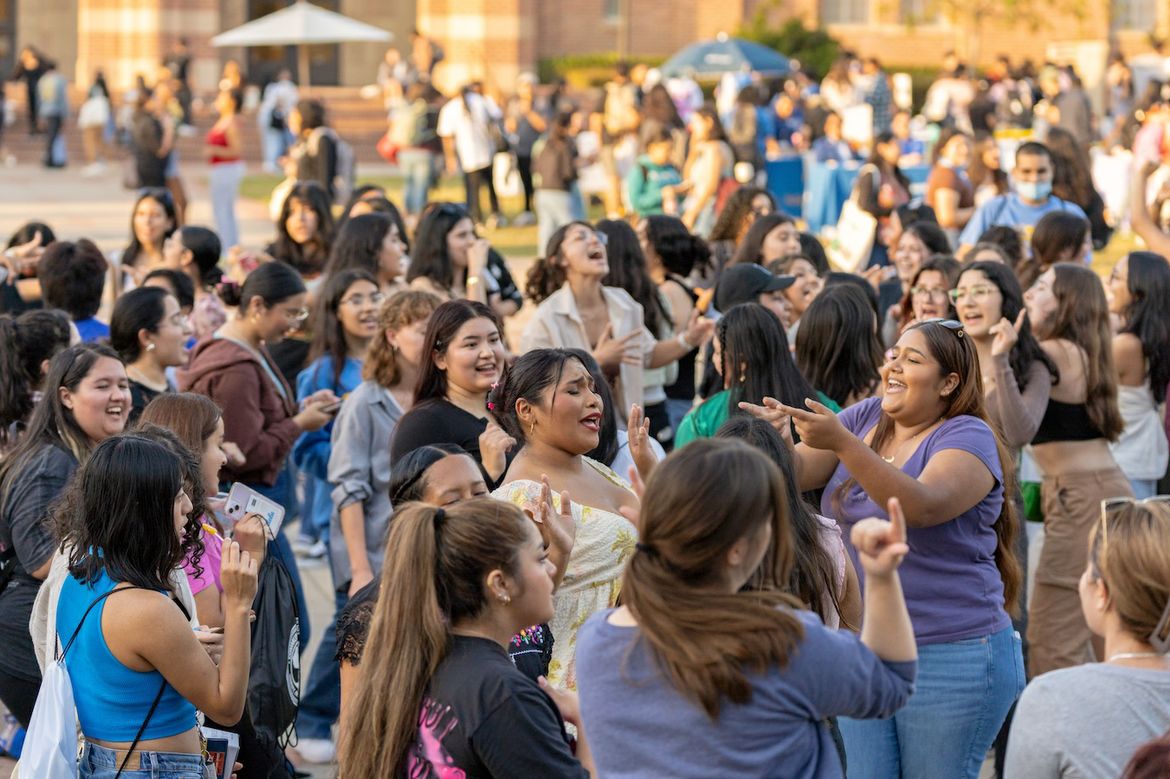 Photo | A crowd of students dancing and singing in Wilson Plaza during ...