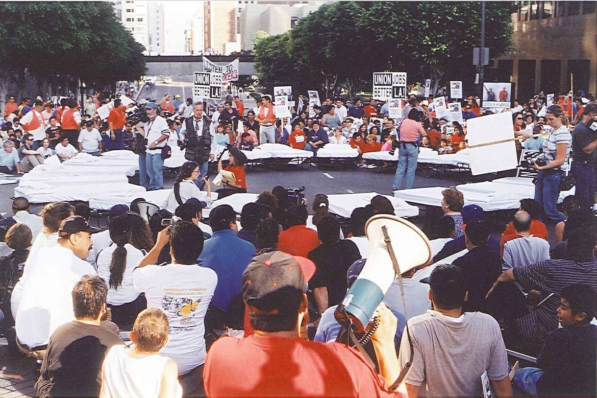 Photo | A group of union protesters with signs in the middle of a Los ...